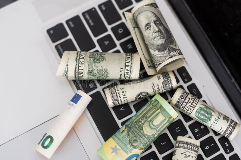Money on Computer Keyboard. Roll Stock Photo - Image of internet ...