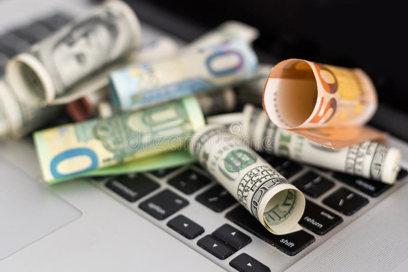 Money on Computer Keyboard. Roll Stock Image - Image of internet ...