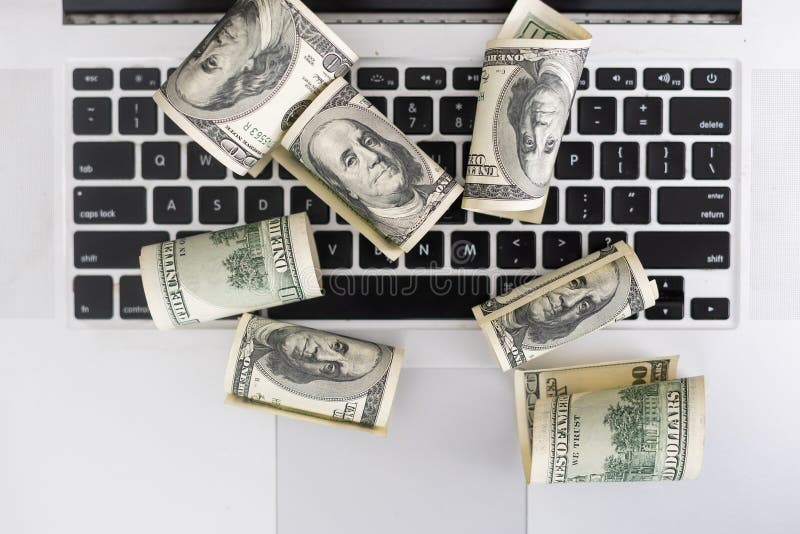 Money on Computer Keyboard. Roll Stock Image - Image of buying ...