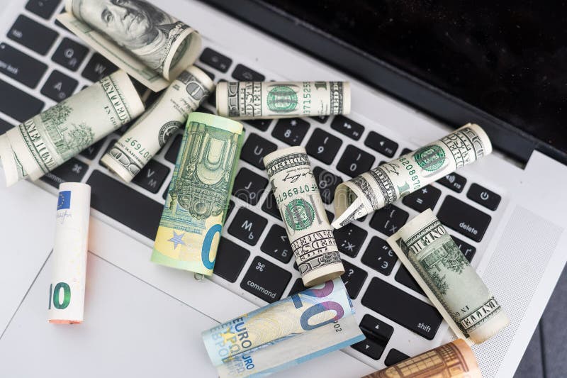 Money on Computer Keyboard. Roll Stock Image - Image of paper, computer ...