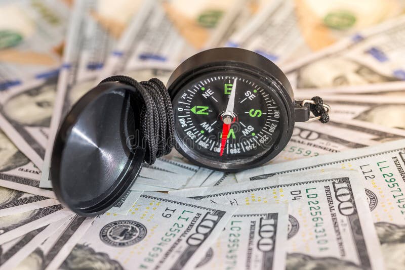 Compass with Dollar. Close Up Stock Image - Image of compass, macro ...
