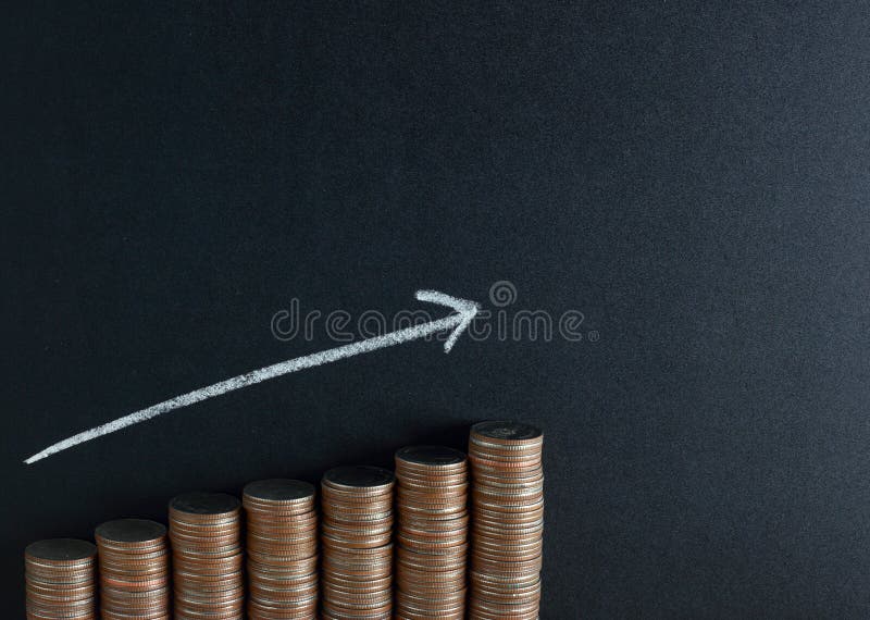 Money Concept - Stack of Coins Rising Up Like Growing Arrow Against ...