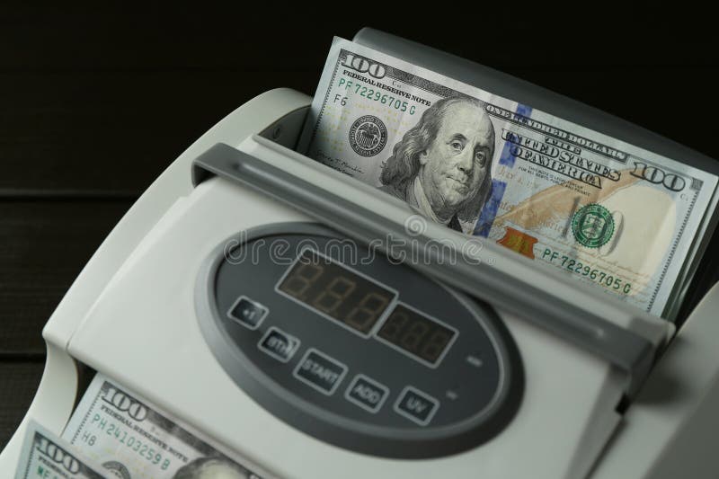 Money Counter Machine with Dollar Banknotes on Table, Closeup Stock ...
