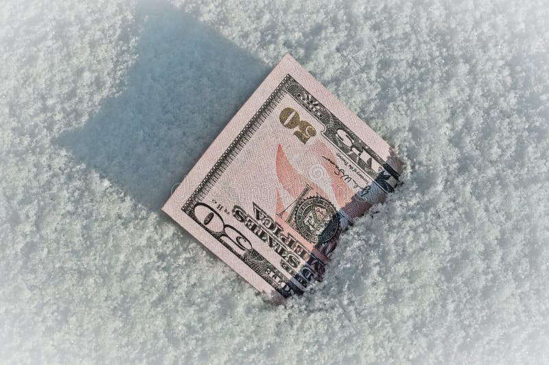 Money is covered with snow stock image. Image of money - 23922917