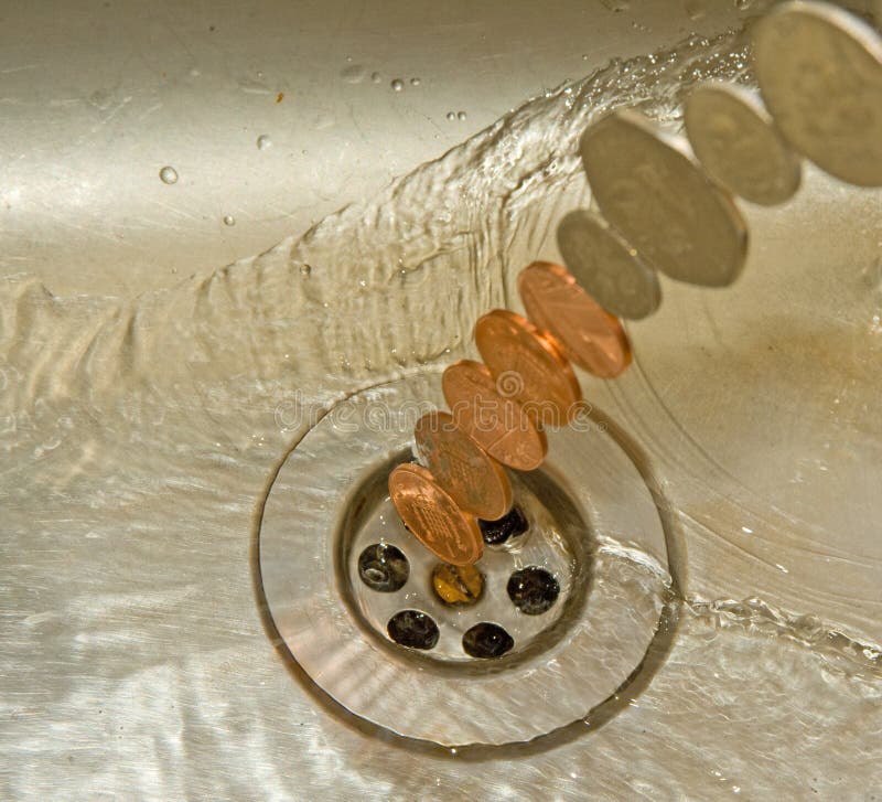 Money down the drain. stock image. Image of straights - 11094151