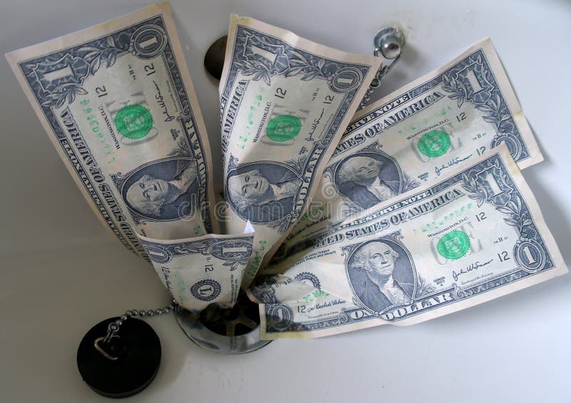 Money down the drain stock image. Image of bankruptcy - 99222297