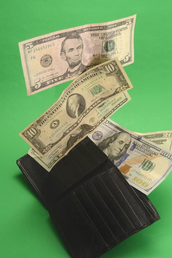 Money Flying out of Wallet stock image. Image of wallet - 88134427