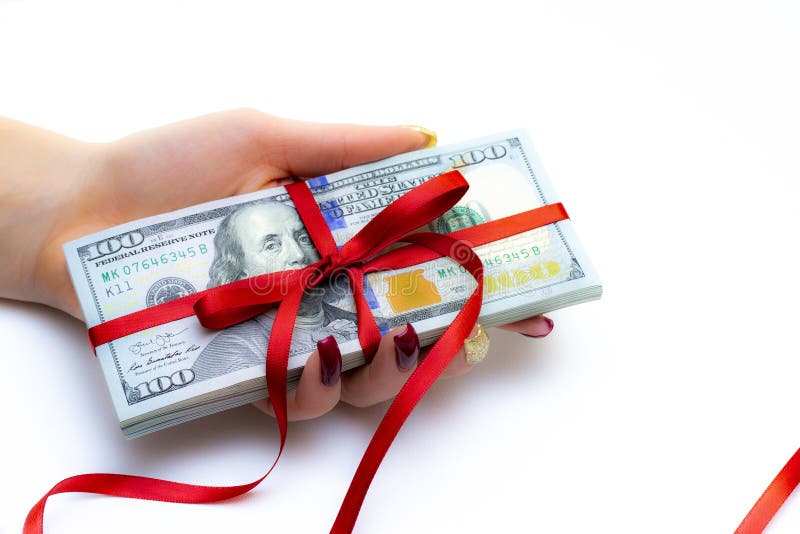 Gift of Money. Stack of Dollar Bills with Red Ribbon Isolated on White ...