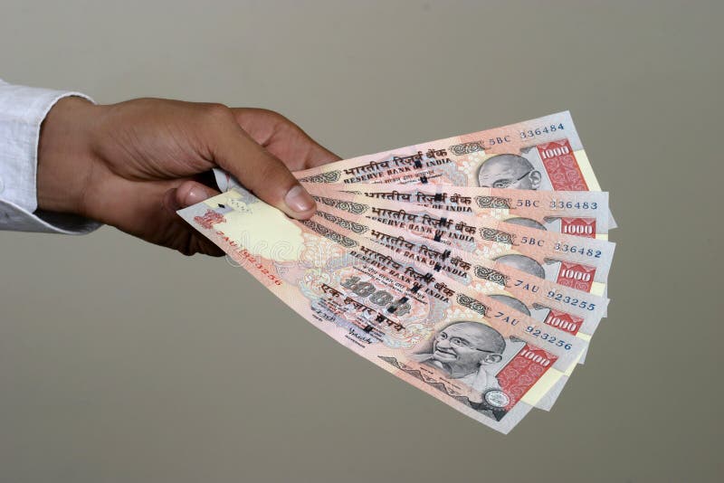 Paying in indian rupee stock image. Image of currency - 5402499