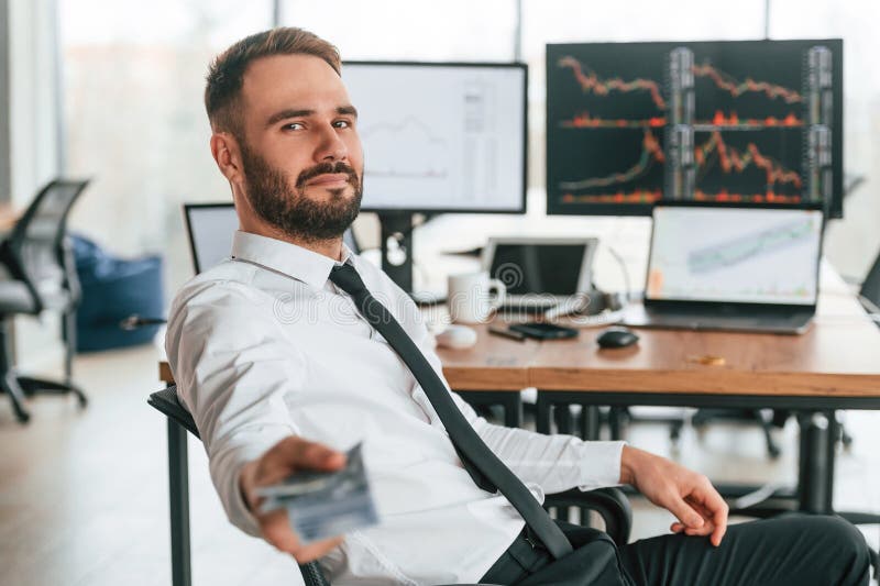 Money in Hand. Businessman is Sitting by Computer and Working in the ...