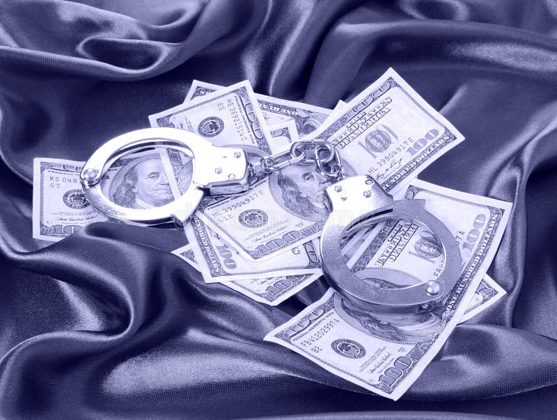 Money and Handcuffs on Silk Fabric Stock Photo - Image of financial ...