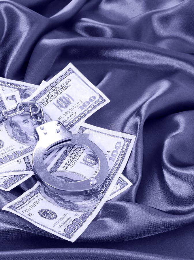 Money and Handcuffs on Silk Fabric Stock Photo - Image of financial ...