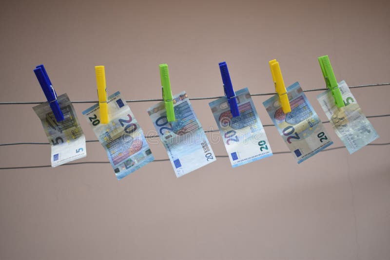 Money hanging on a chain stock image. Image of hold - 174692935