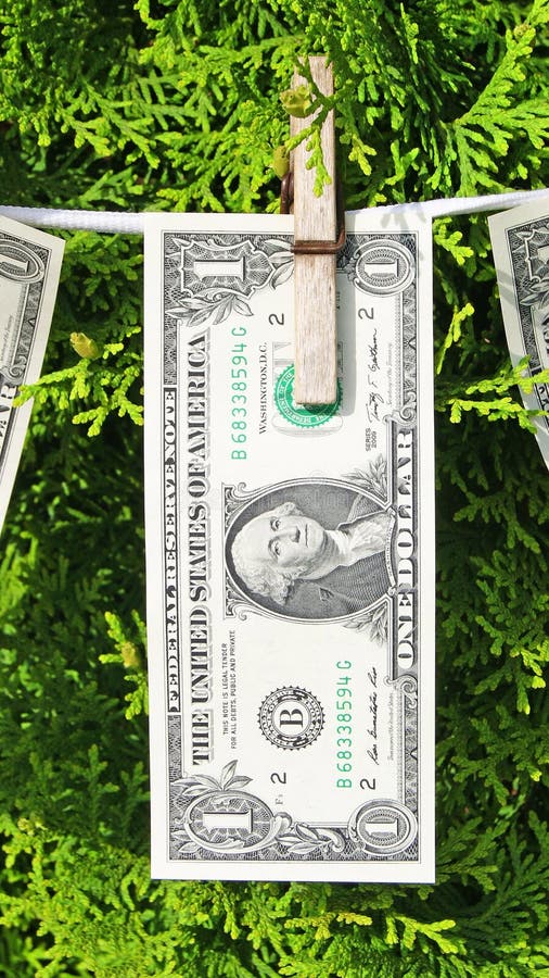 Money hanging on a chain stock image. Image of hold - 174692935
