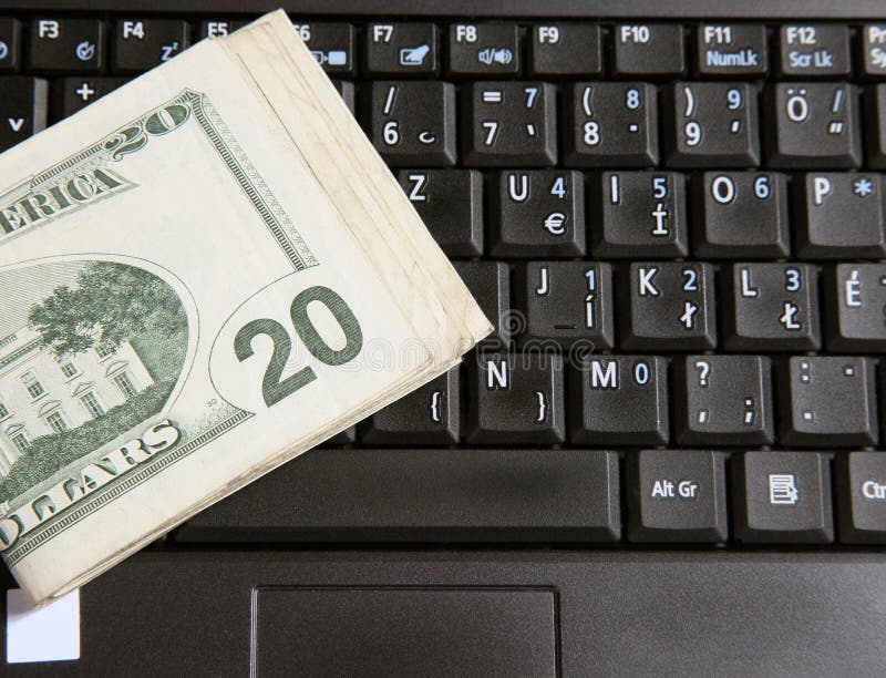 Money and keyboard stock photo. Image of financial, laptop - 18706044