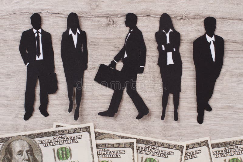 Money and Paper Figures of Business People. Stock Image - Image of ...