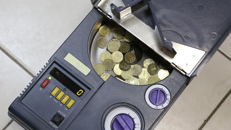 Money Poured Out of the Bag into the Machine for Counting and Sorting ...