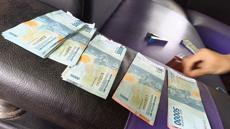 Money 50 Ribu Anda 100 Ribu of Indonesia Stock Image - Image of money ...
