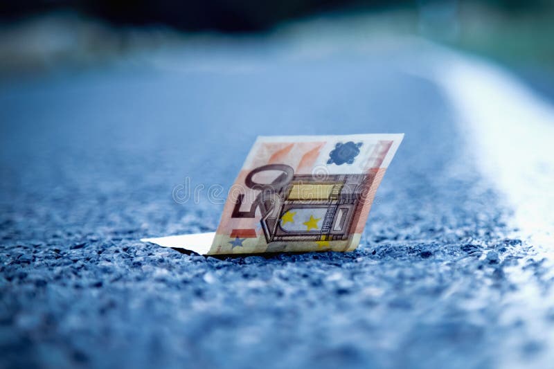 Money on the Road. Wasted Time is Money Lost Concept Stock Image ...