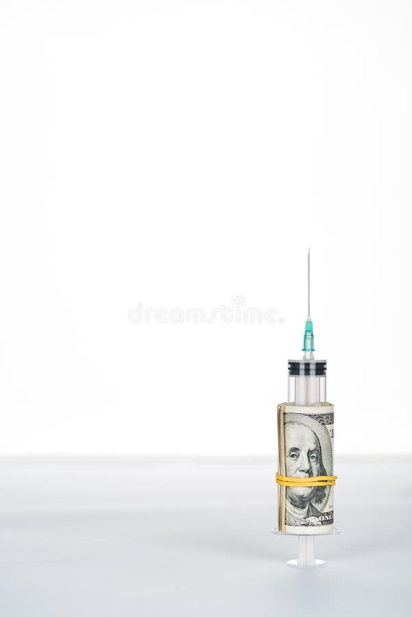 Money Roll and Syringe on Grey Surface Isolated Stock Image - Image of ...