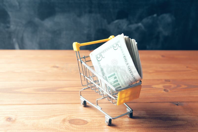 Money in a small cart stock image. Image of cash, finance - 216709921