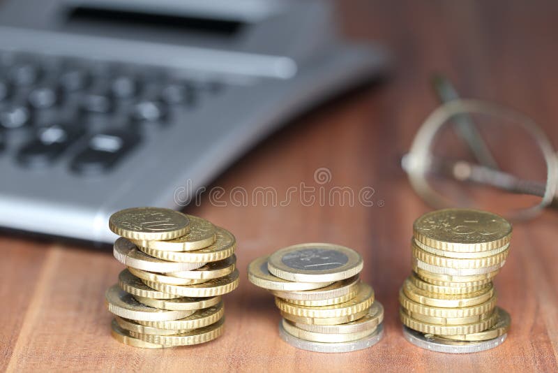 Money stacks on a desk stock image. Image of closeup - 130571485