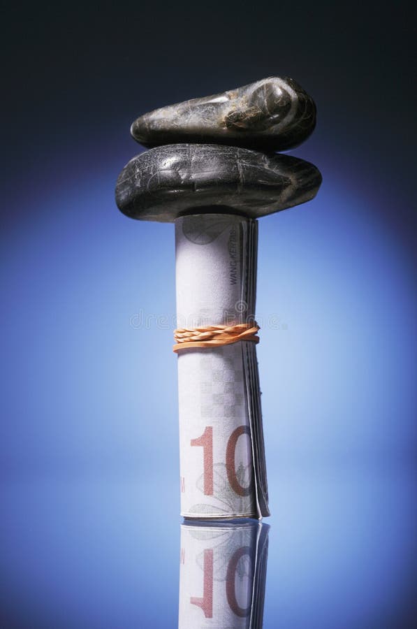 Money and stone stock photo. Image of strength, currency - 48960264