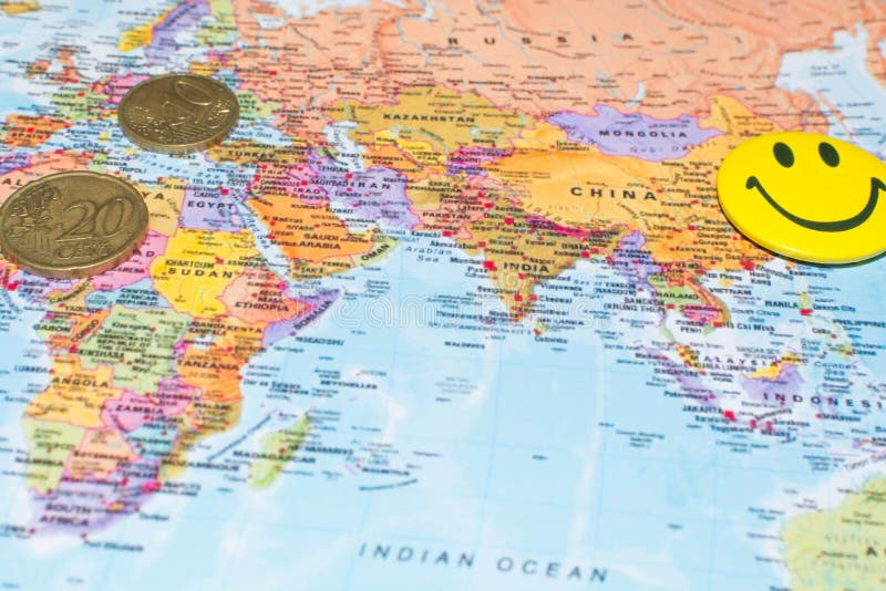 Money on the world map 2 stock image. Image of globe - 153973311