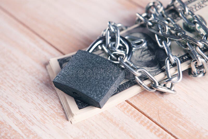 Money Wrapped in a Chain and Closed with a Padlock Stock Image - Image ...