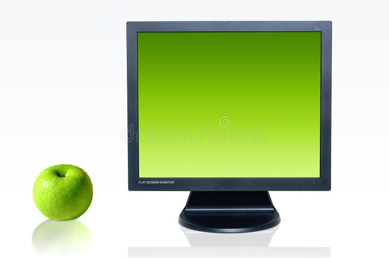 Monitor and green apple stock photo. Image of tech, business - 407702