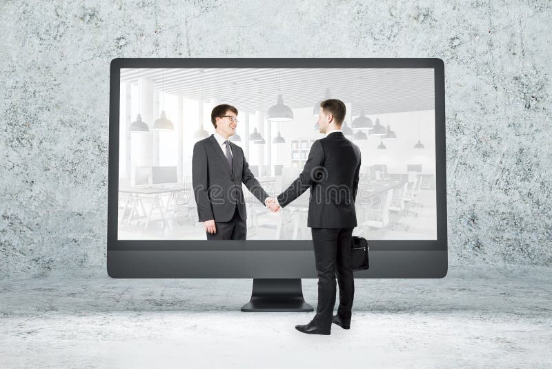 Monitor with shaking hands stock image. Image of hand - 166185437