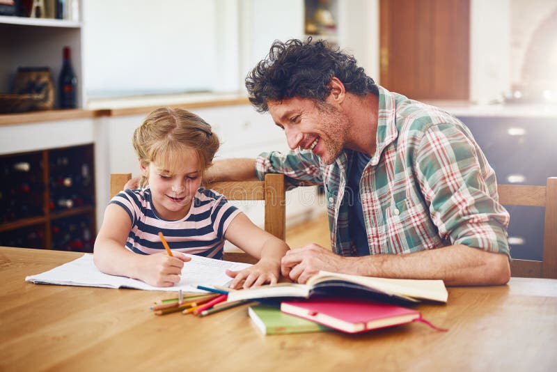 Monitoring Homework Time. a Father Helping His Daughter with Her ...