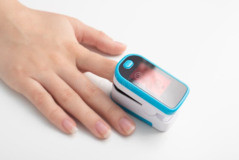 Monitoring Oxygen Saturation with a Special Device Stock Photo - Image ...