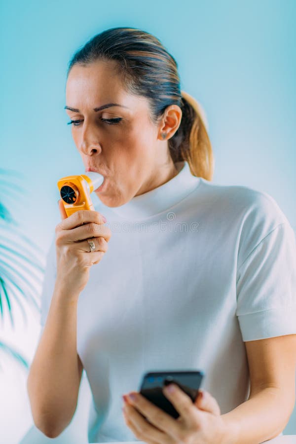 Spirometry. Using Spirometer and Smart Phone Stock Photo - Image of ...