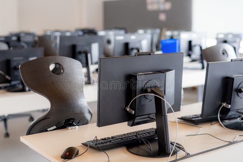 Monitors and Keyboard in an Empty Computer Lab at a Secondary School Stock Photo - Image of ...