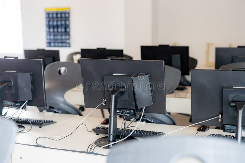 Monitors and Keyboard in an Empty Computer Lab at a Secondary School ...