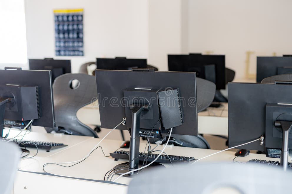 Monitors and Keyboard in an Empty Computer Lab at a Secondary School Stock Photo - Image of ...