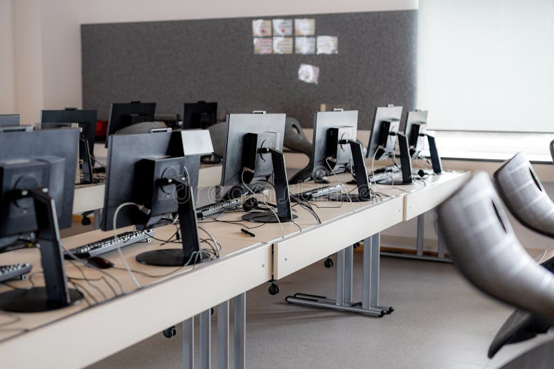 Monitors and Keyboard in an Empty Computer Lab at a Secondary School Stock Photo - Image of ...