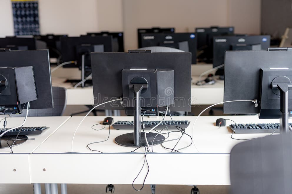 Monitors and Keyboard in an Empty Computer Lab at a Secondary School Stock Image - Image of ...