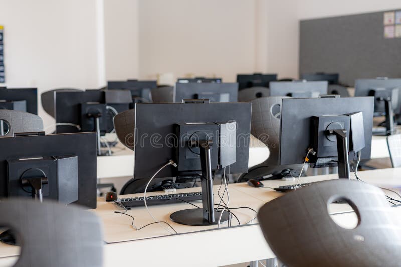 Monitors and Keyboard in an Empty Computer Lab at a Secondary School Stock Image - Image of ...
