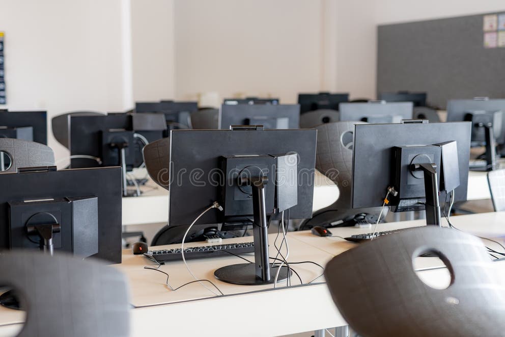 Monitors and Keyboard in an Empty Computer Lab at a Secondary School Stock Image - Image of ...