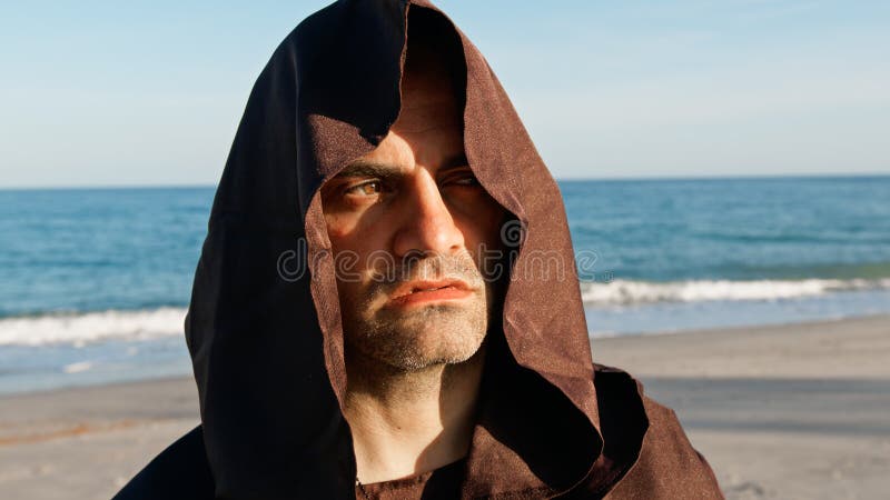 Monk Finding Peace at the Beach Stock Photo - Image of worship, beach ...