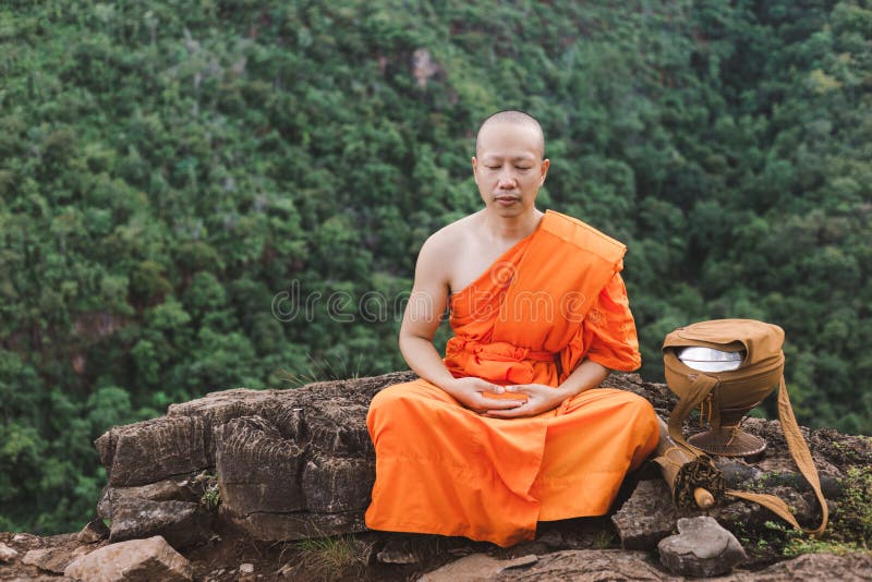 Monk Meditating on Top of a Mountain, Purify the Mind Stock Image ...
