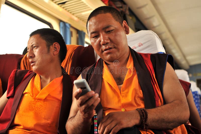Monk and mobile phone editorial stock photo. Image of china - 12735838