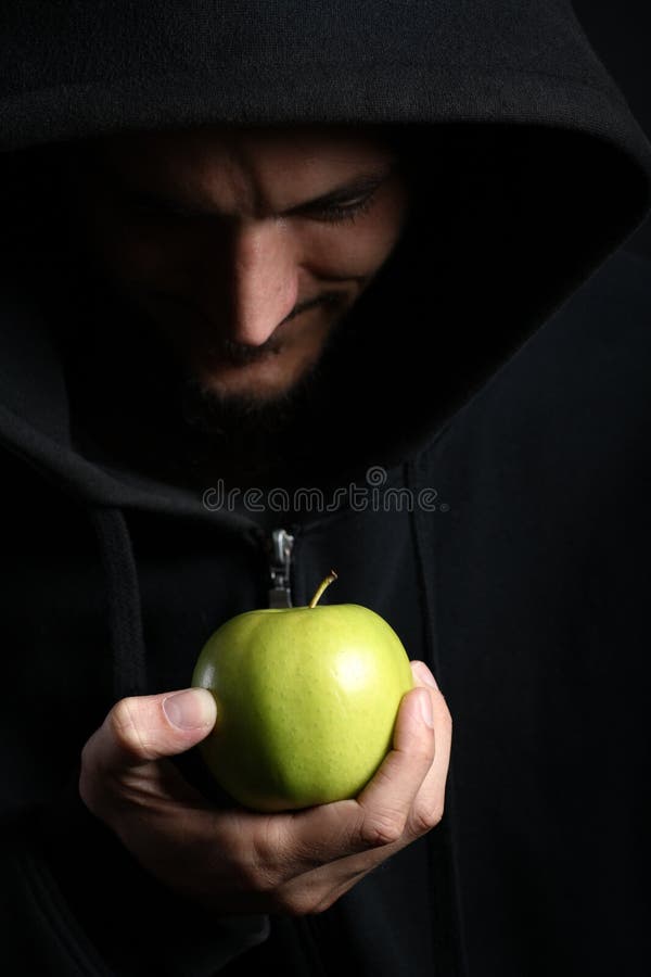 Monk offers an apple stock image. Image of male, monk - 8971303