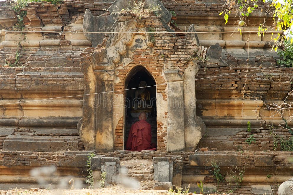 Sitting in Ancient Prayer editorial image. Image of burmese - 30147315
