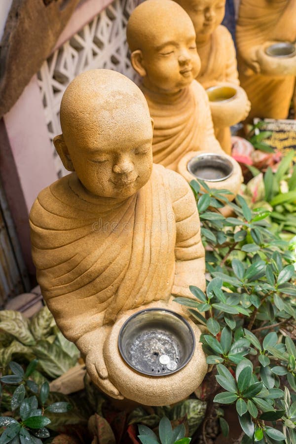 Monk statue stock photo. Image of buddhist, flower, ancient - 95777840