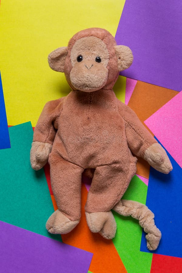 Monkey Doll on Colorful Background Stock Photo - Image of graphic ...