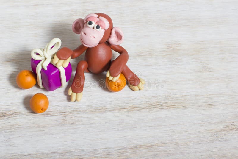 Monkey Figure from Plasticine Stock Image - Image of gift, holds: 62246837