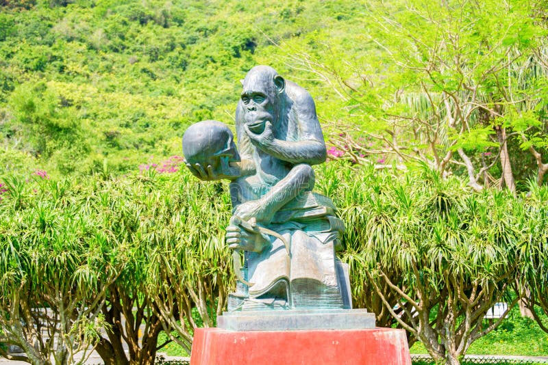 Monkey Statue Made of Stone, in the Pose of Sensible Over the Human ...